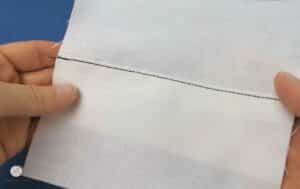 Couture appliquée plaquée (nervure)